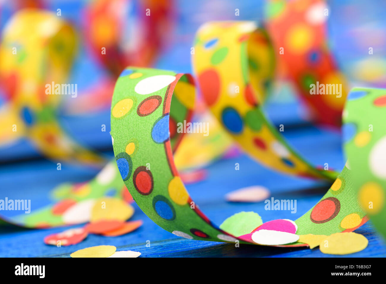 confetti and paper streamer at carnival Stock Photo - Alamy