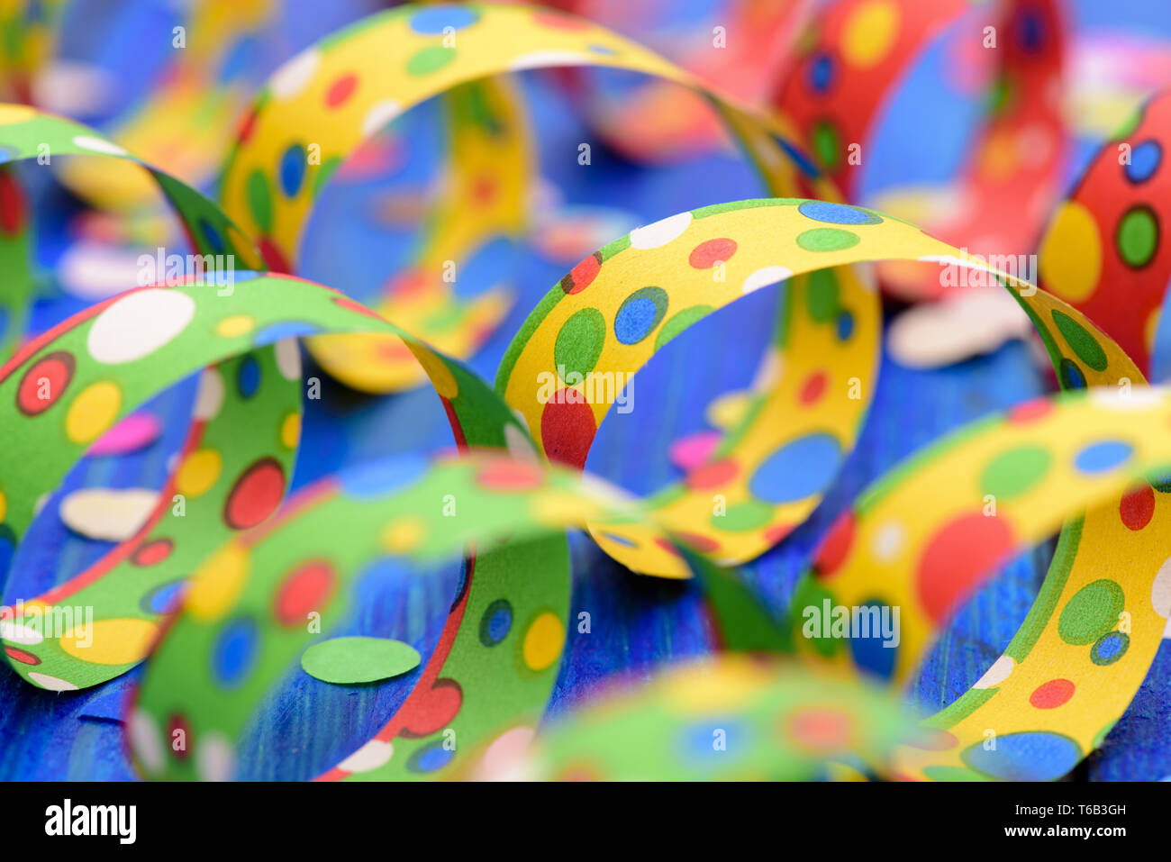 confetti and paper streamer at carnival Stock Photo - Alamy