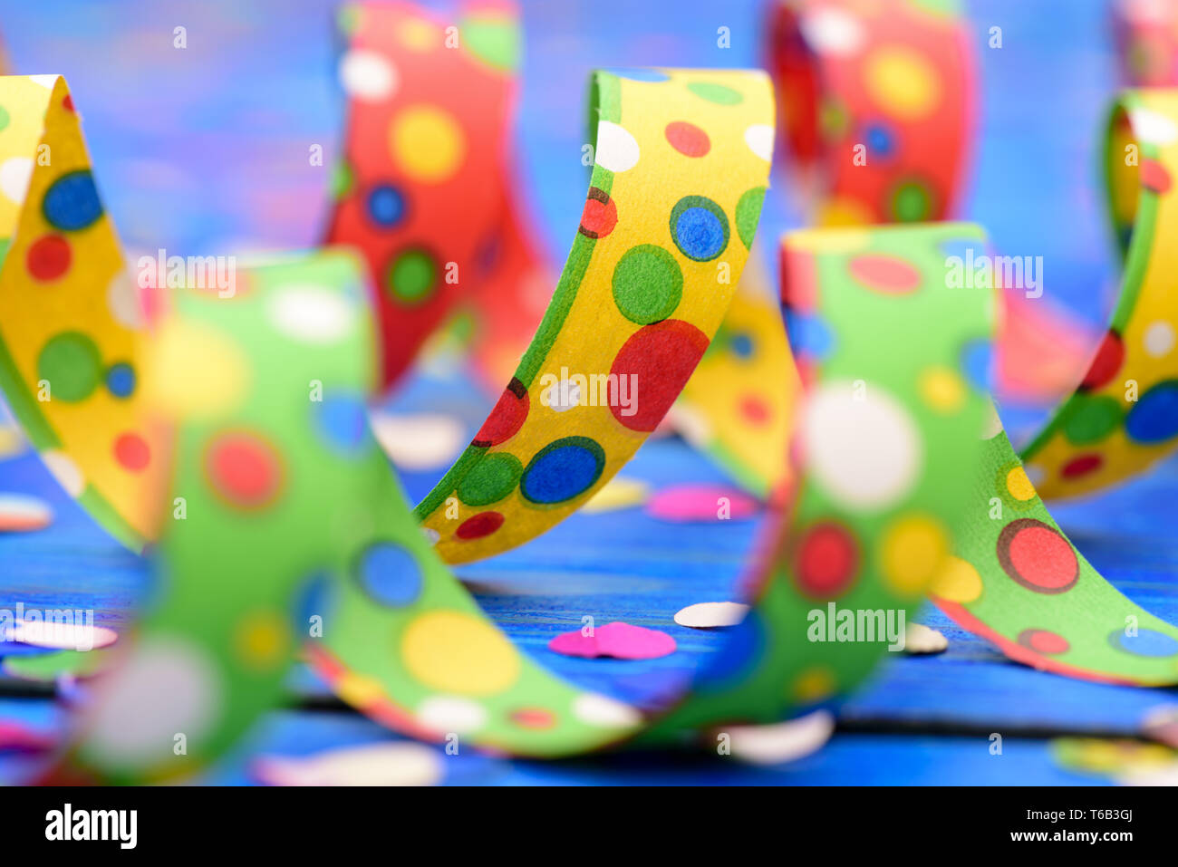 confetti and paper streamer at carnival Stock Photo - Alamy