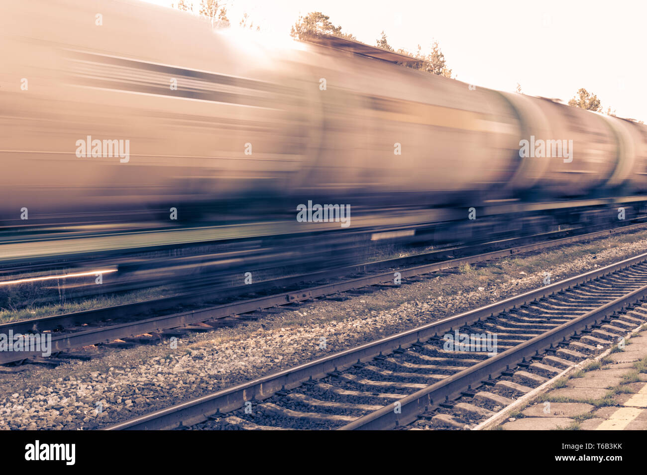 Train with oil tanks moving Stock Photo - Alamy
