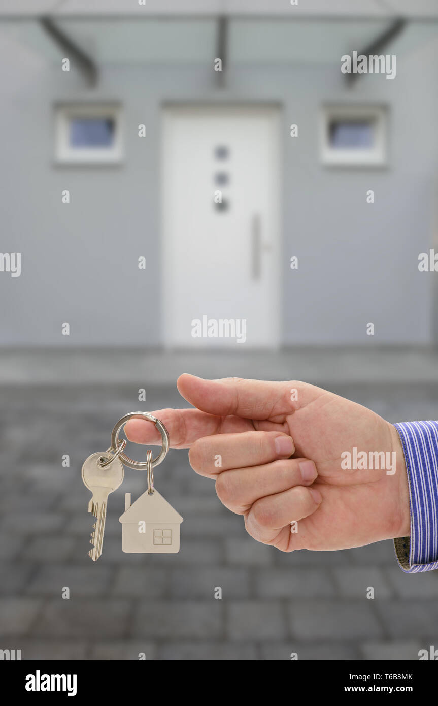 key in hand for new home and real estate Stock Photo - Alamy