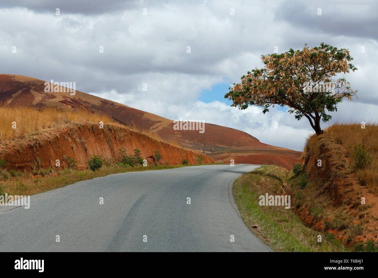 Road through Madagascar highland countryside landscape Stock Photo - Alamy
