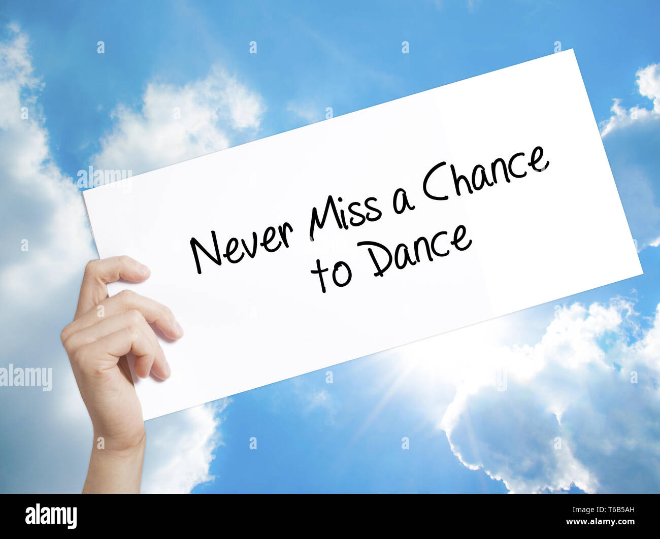 Never Miss a Chance to Dance Sign on white paper. Man Hand Holding ...