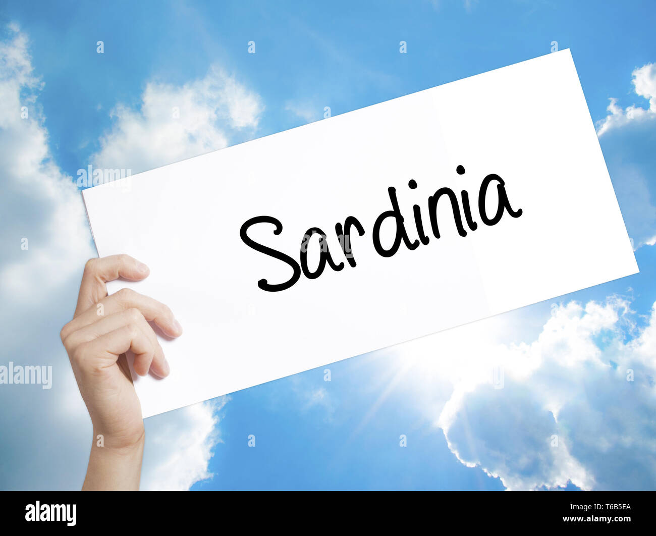 Sardinia Sign on white paper. Man Hand Holding Paper with text ...