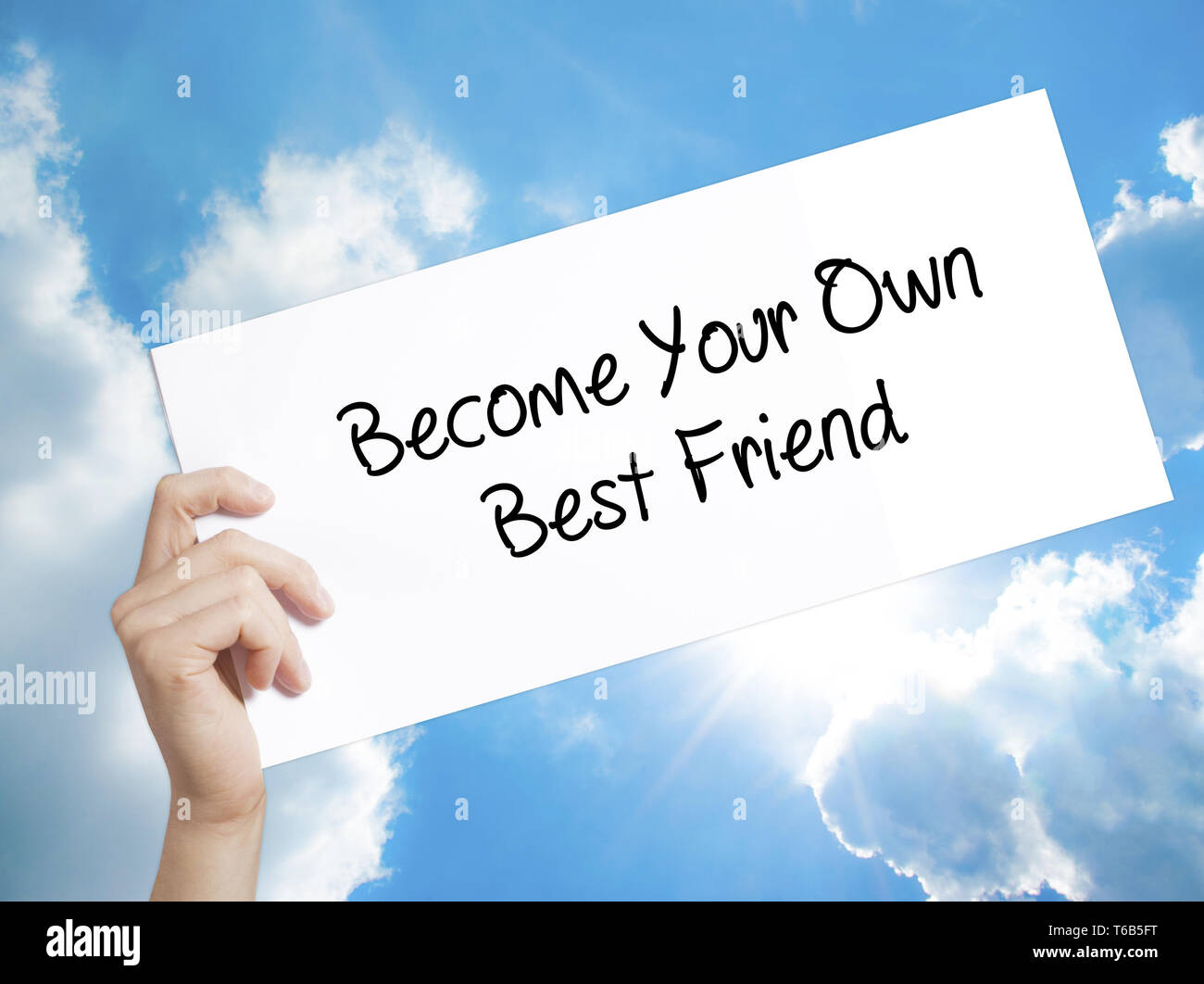Become Your Own Best Friend Sign on white paper. Man Hand Holding Paper ...