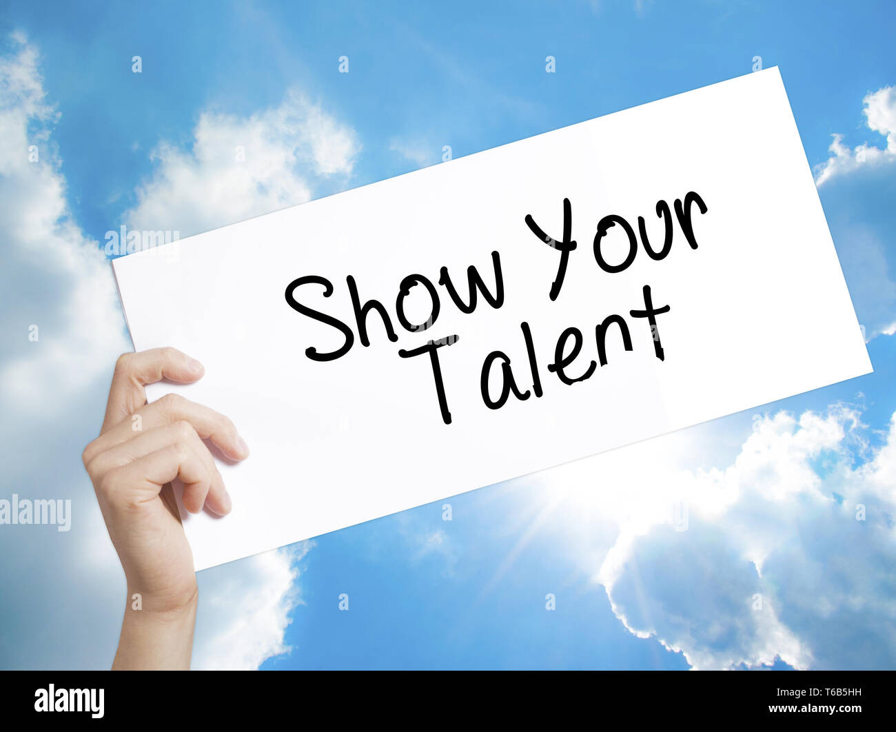 Show your Talent Sign on white paper. Man Hand Holding Paper with text ...
