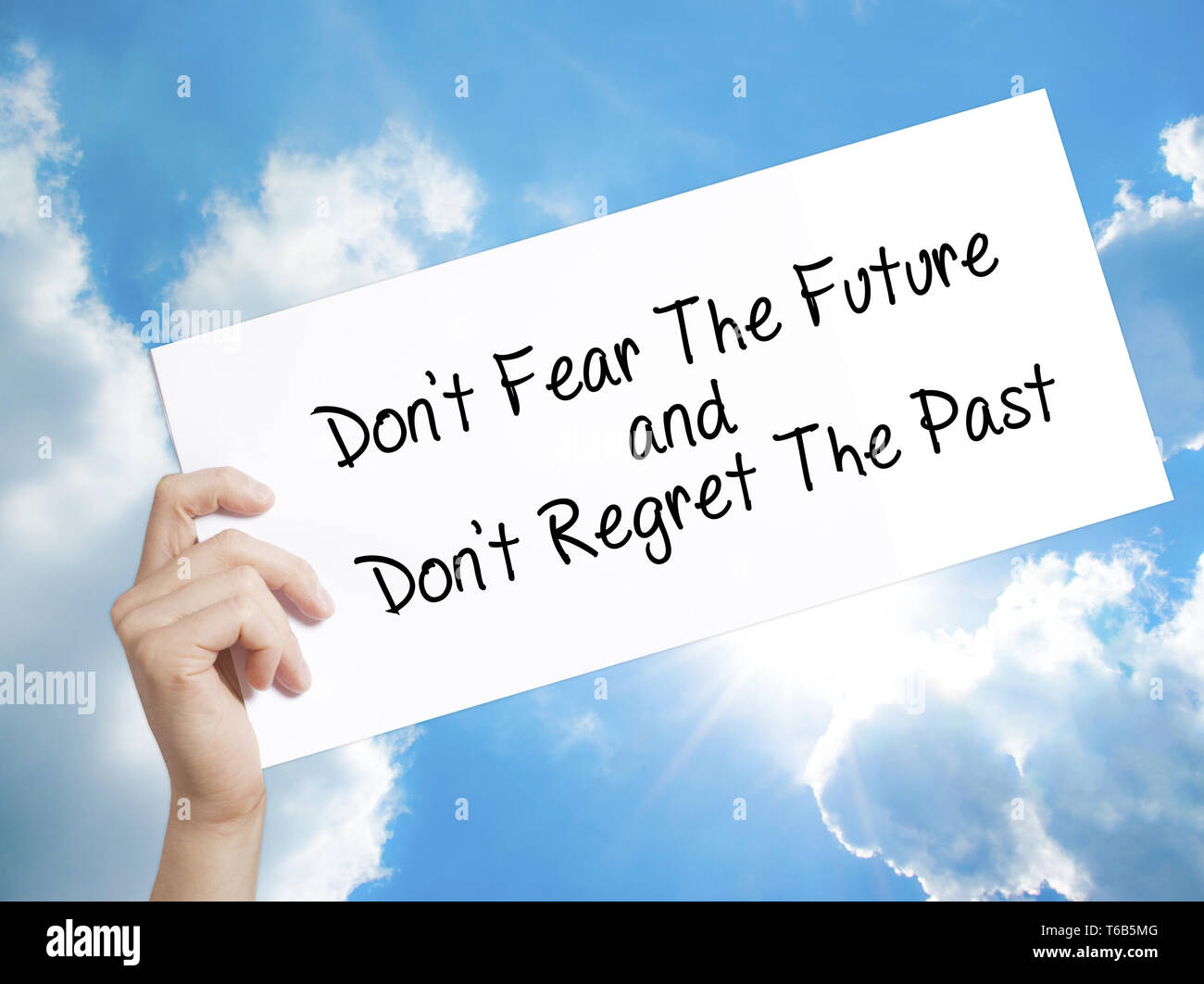 Don't Fear The Future and Don't Regret The Past Sign on white paper ...