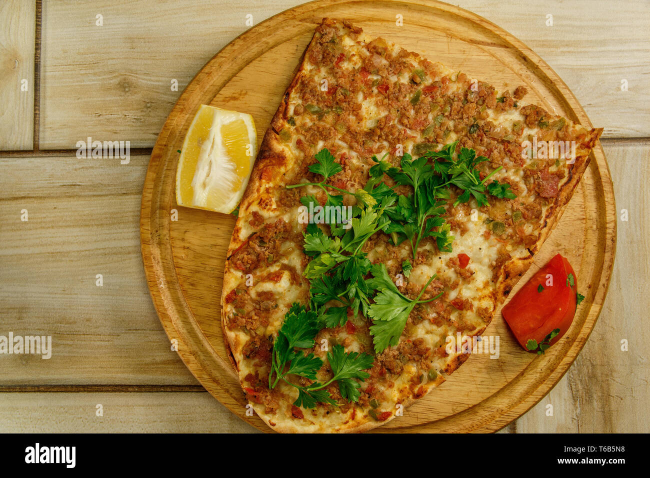 turkish food lahmacun on a wooden tray Stock Photo - Alamy
