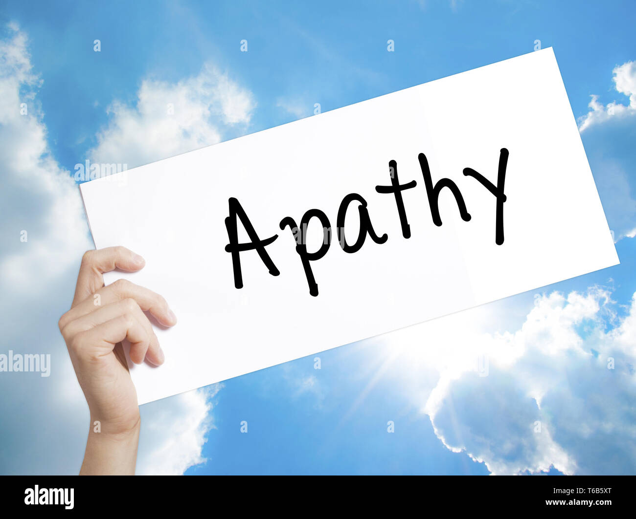 Apathy Sign on white paper. Man Hand Holding Paper with text. Isolated ...