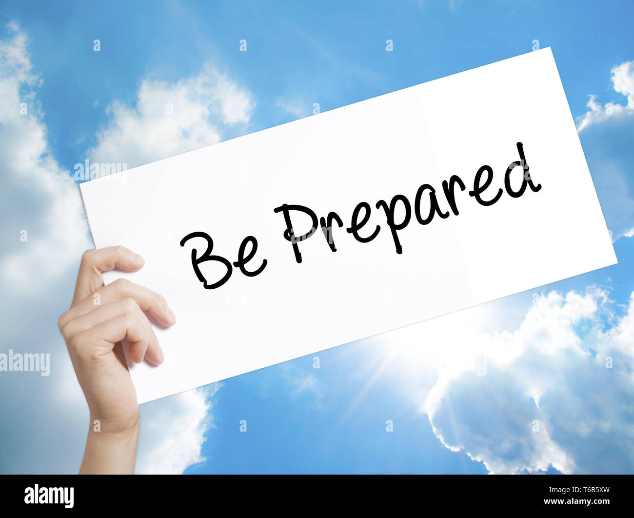 Be Prepared Sign on white paper. Man Hand Holding Paper with text ...