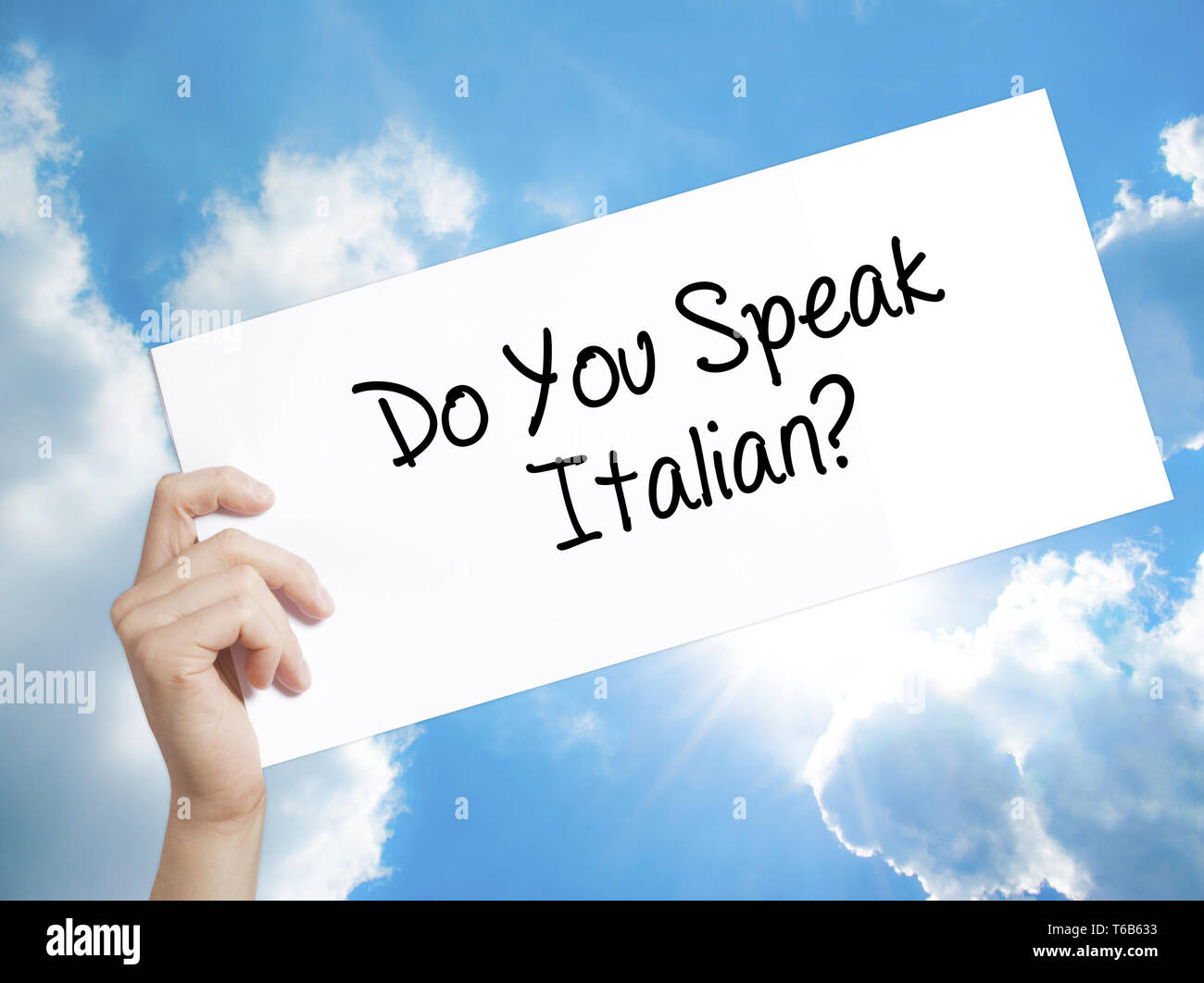Do You Speak Italian? Sign on white paper. Man Hand Holding Paper with ...
