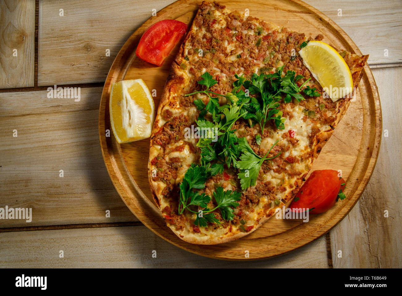 turkish food lahmacun on a wooden tray Stock Photo - Alamy