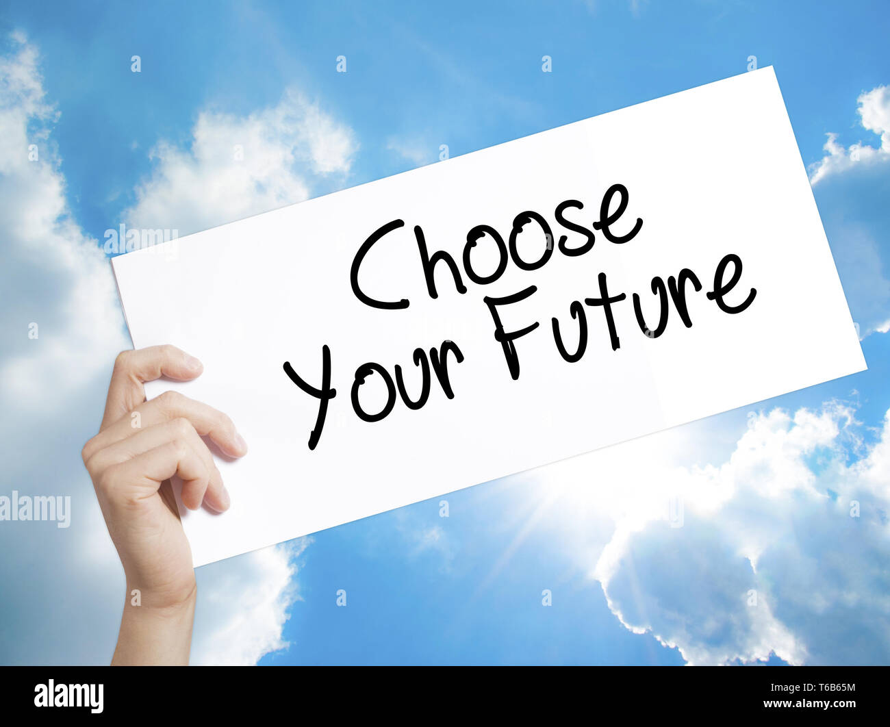 Choose your Future Sign on white paper. Man Hand Holding Paper with ...