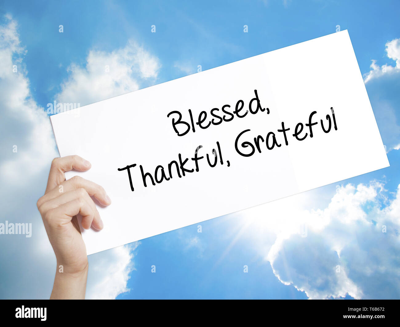 Blessed Thankful Grateful Sign on white paper. Man Hand Holding Paper ...