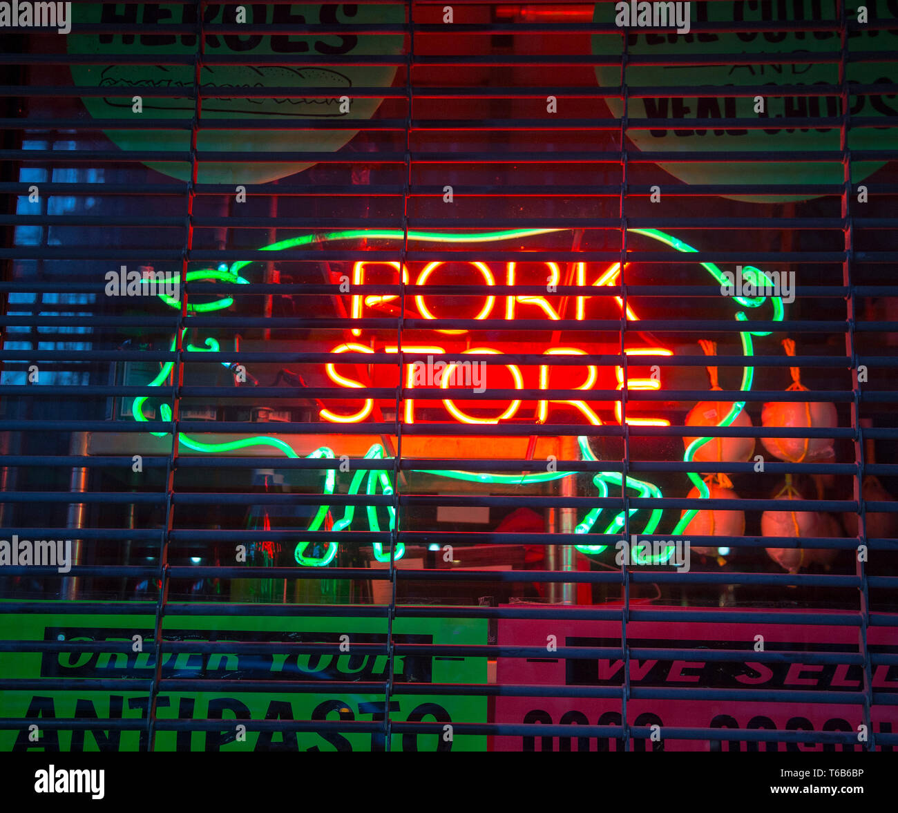 Neon sign in the window of a pork store in Brooklyn, NY Stock Photo - Alamy