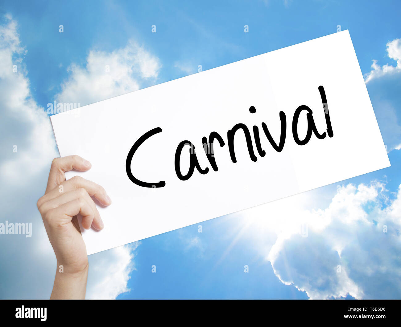 Carnival Sign on white paper. Man Hand Holding Paper with text ...