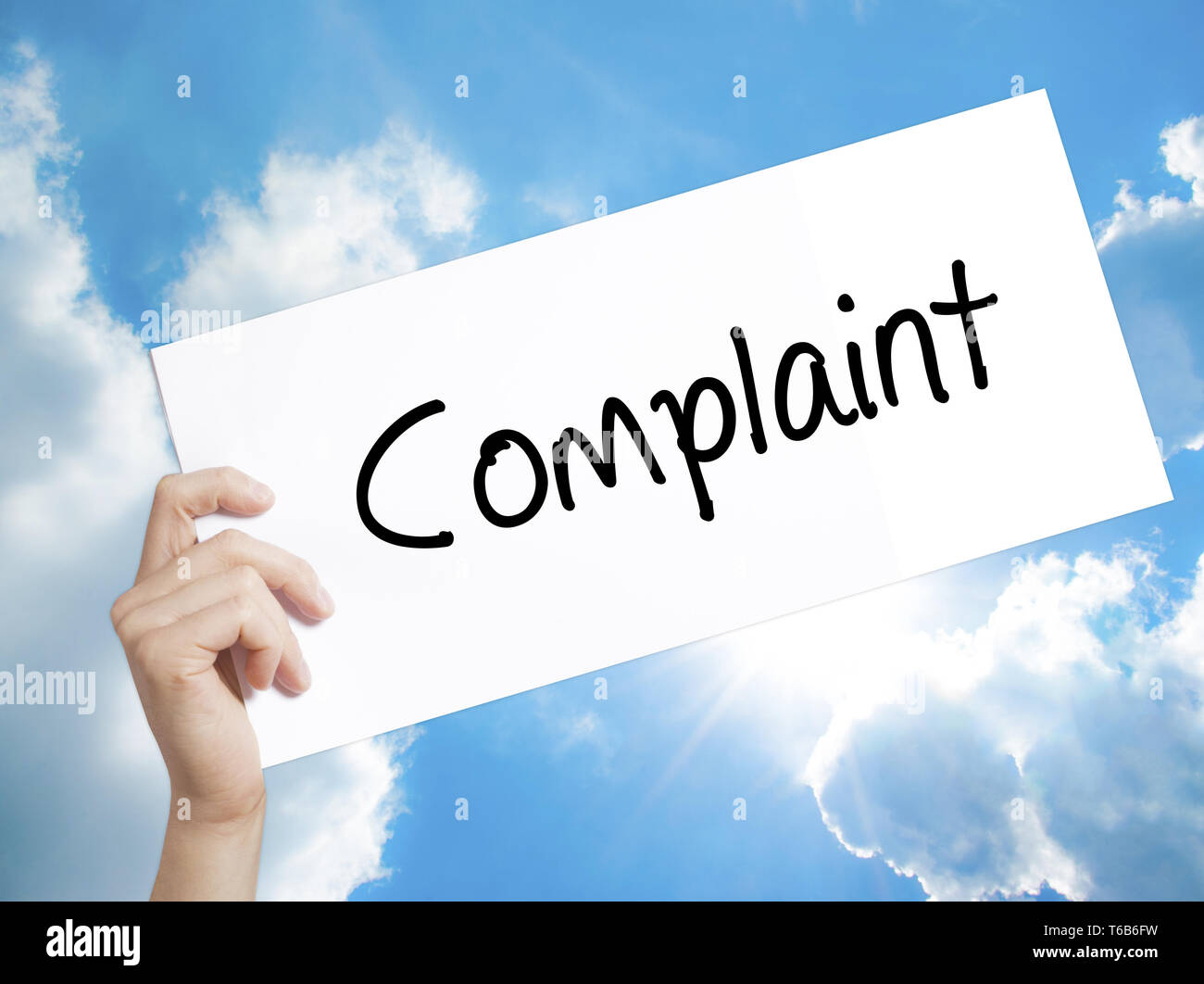 Complaint Sign on white paper. Man Hand Holding Paper with text ...