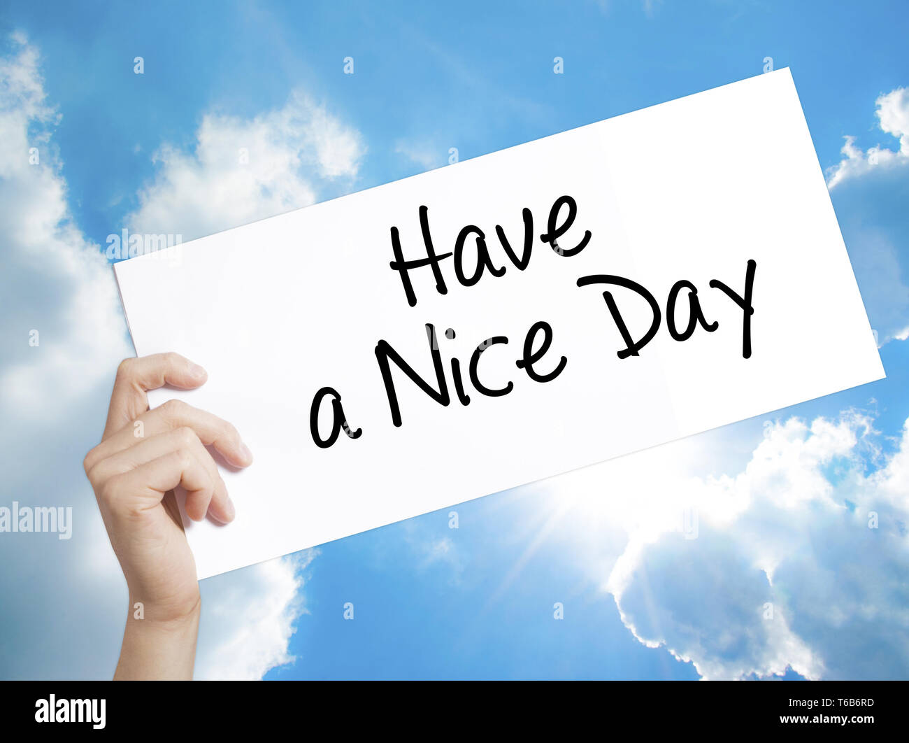 Have a Nice Day Sign on white paper. Man Hand Holding Paper with text ...