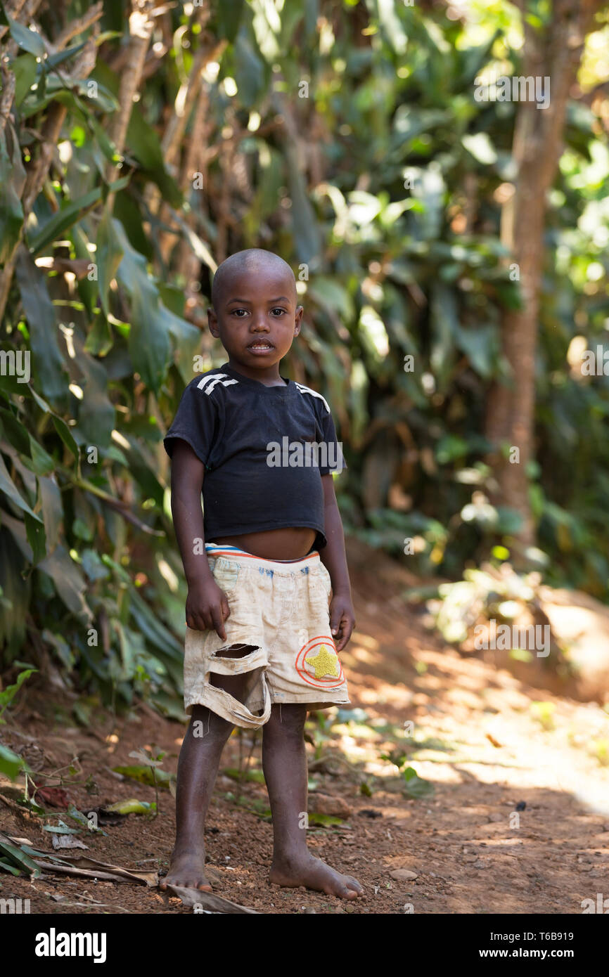 Boy torn clothes hi-res stock photography and images - Alamy