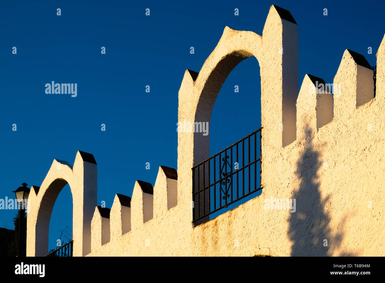 Evening light on the Moorish architecture of Castillo de Comares ...