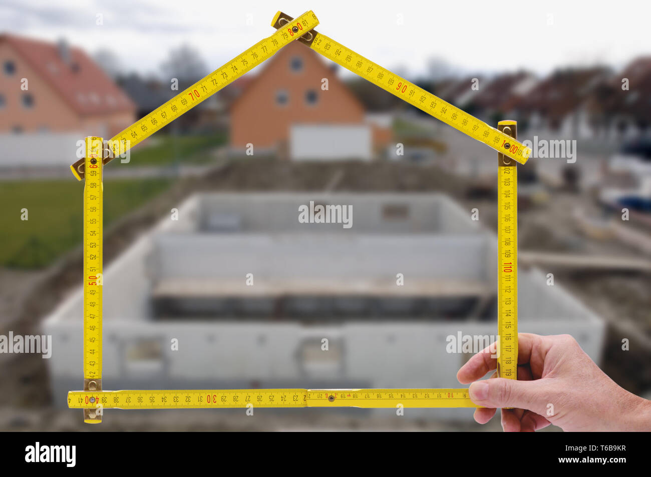 Construction folding ruler house shape hi-res stock photography and ...