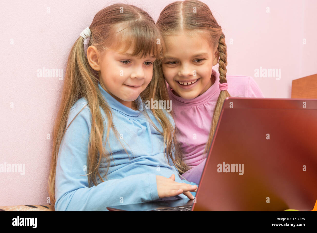 Two girls playing in play hi-res stock photography and images - Alamy