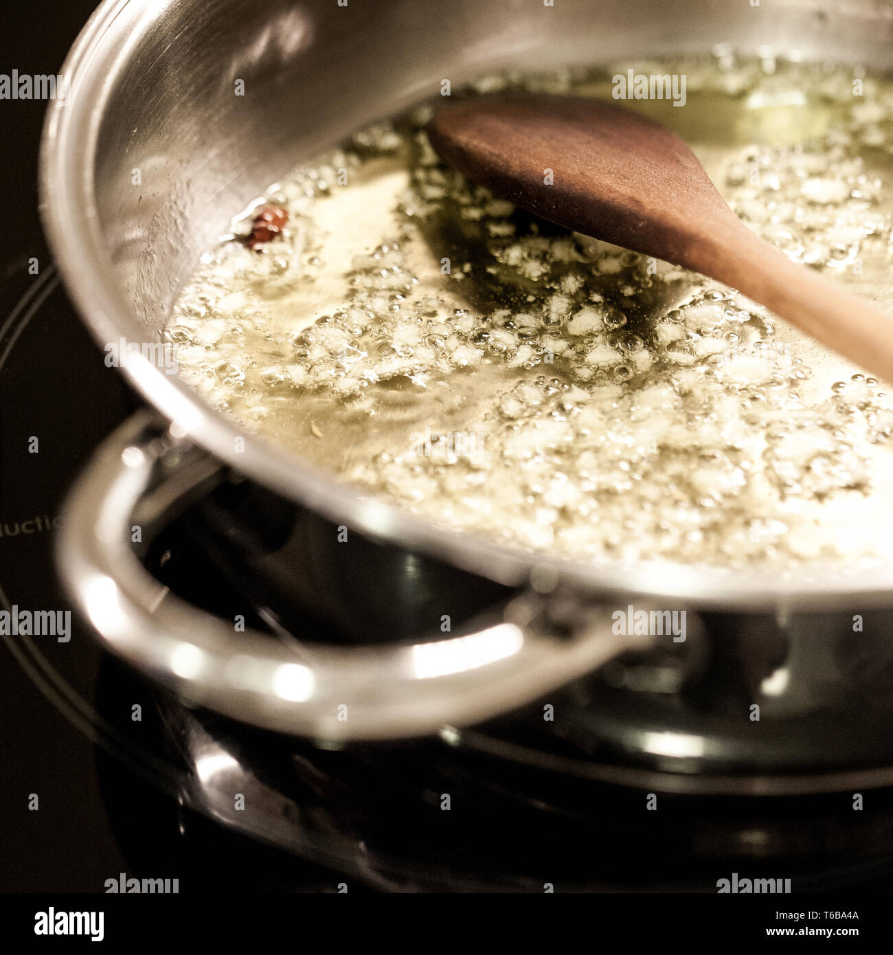 Traditional Basque meal - baby eel fried with garlic in olive oil Stock ...