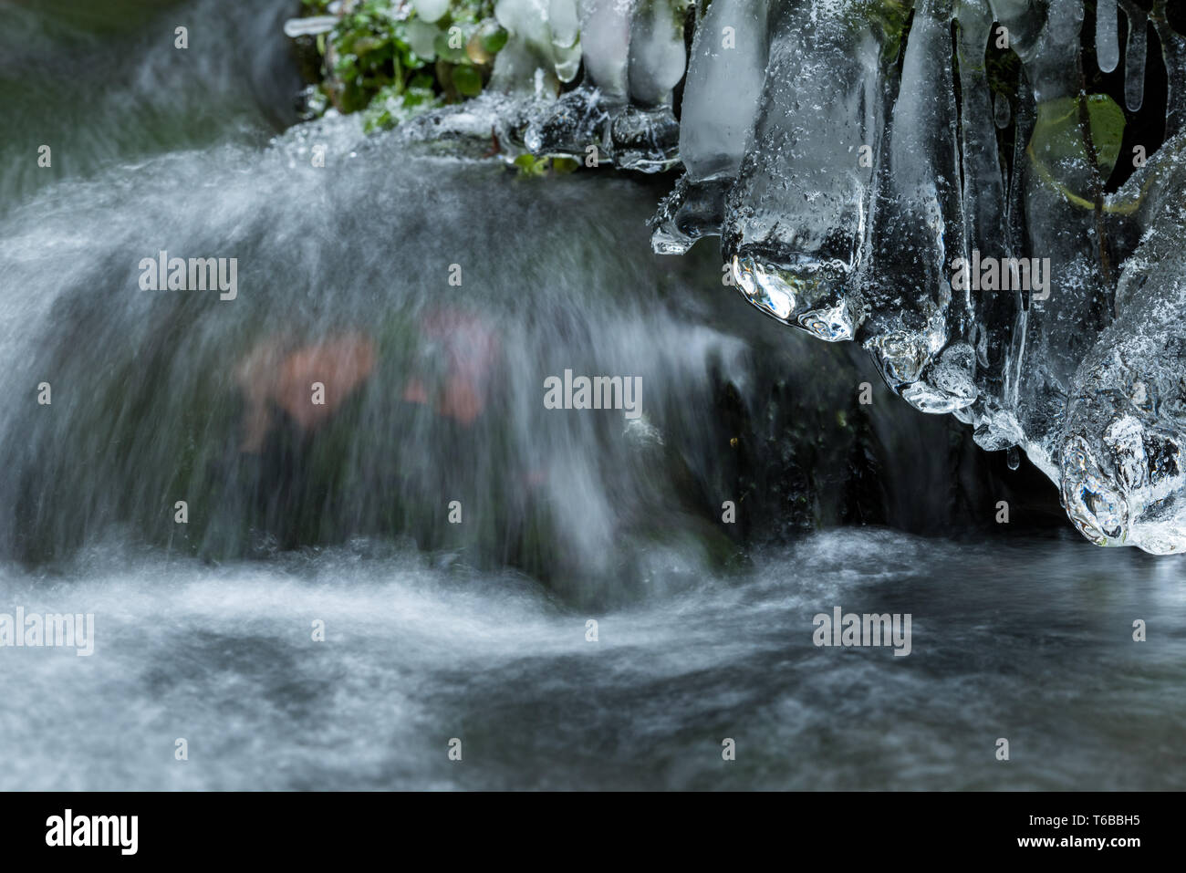 Frozen German stream Stock Photo - Alamy
