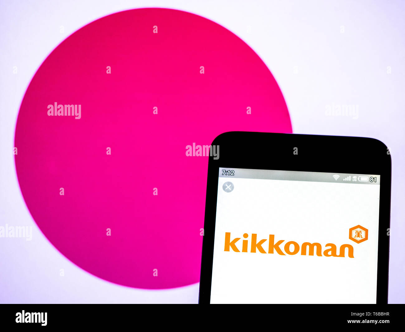 In this photo illustration a Kikkoman Corporation logo seen displayed ...