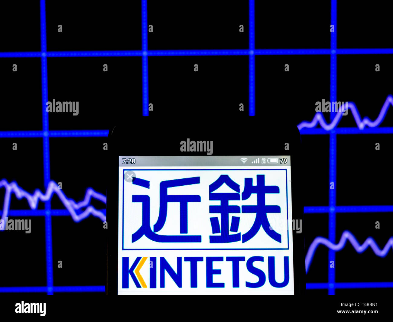 In this photo illustration a Kintetsu Group Holdings Co., Ltd. logo seen displayed on a smart ...