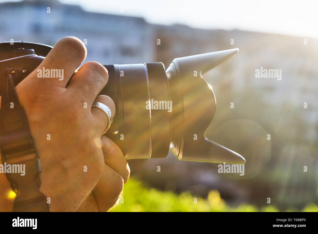 close up of photographers hands with camera Stock Photo - Alamy