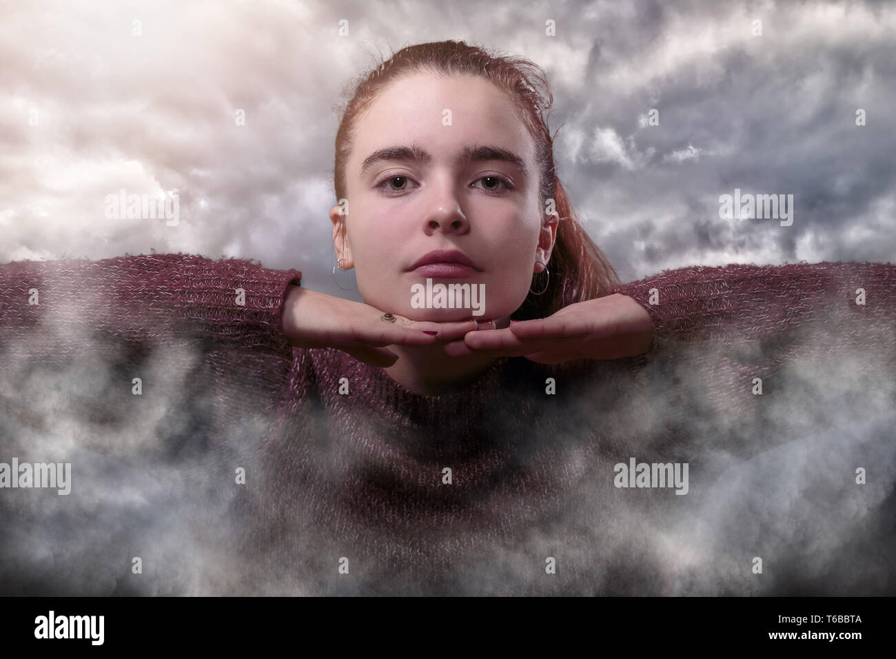 Woman in the clouds hi-res stock photography and images - Alamy