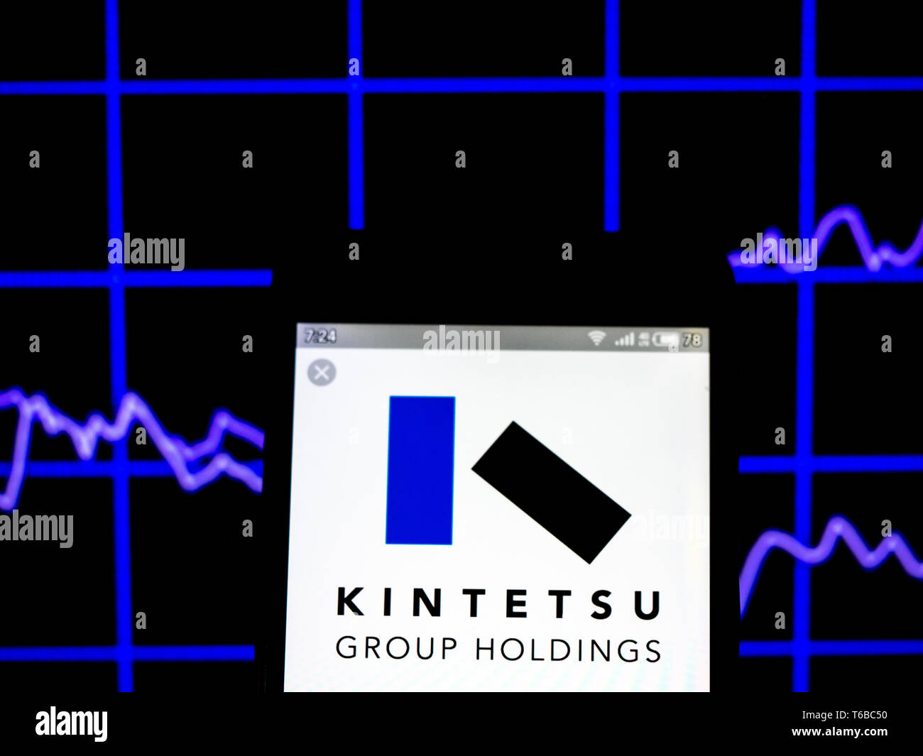 In this photo illustration a Kintetsu Group Holdings Co., Ltd. logo seen displayed on a smart ...