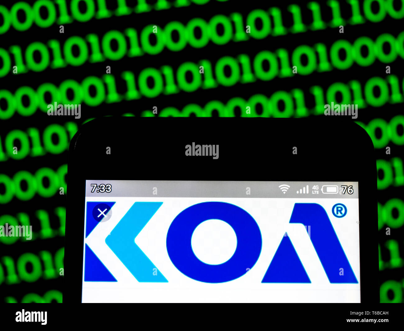 In this photo illustration a KOA Corporation logo seen displayed on a ...