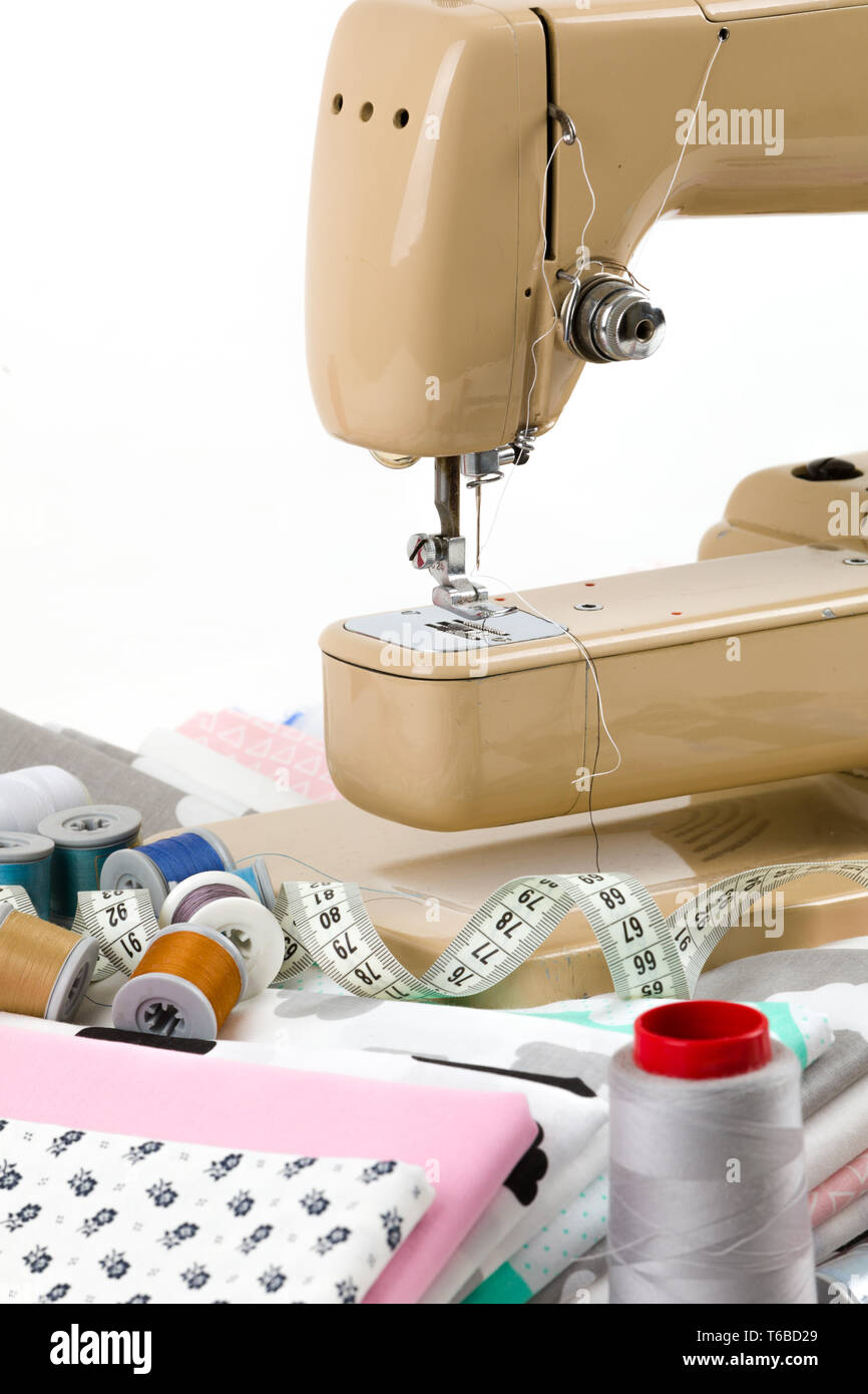 Sewing machine, fabric and measurement tape Stock Photo - Alamy