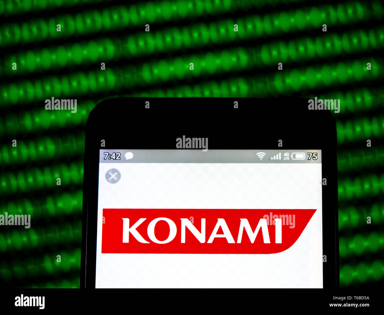 In this photo illustration a Konami Holdings Corporation logo seen ...