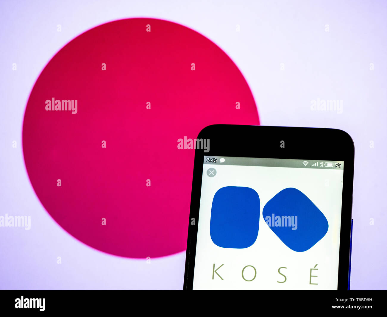 In this photo illustration a Kose Corporation logo seen displayed on a ...