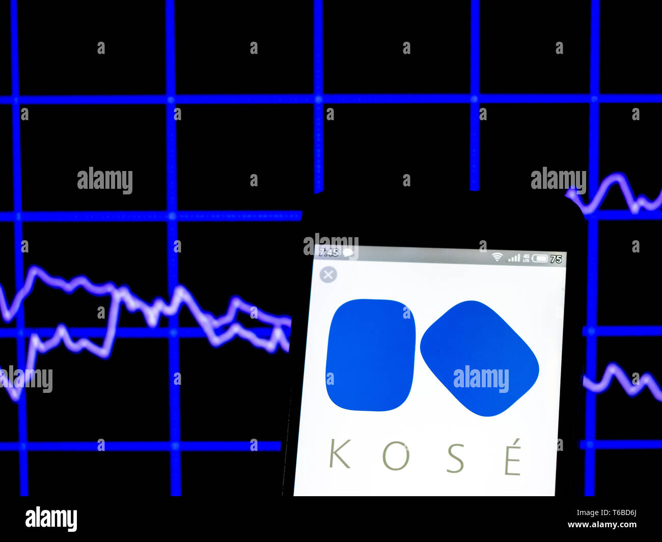 In this photo illustration a Kose Corporation logo seen displayed on a ...