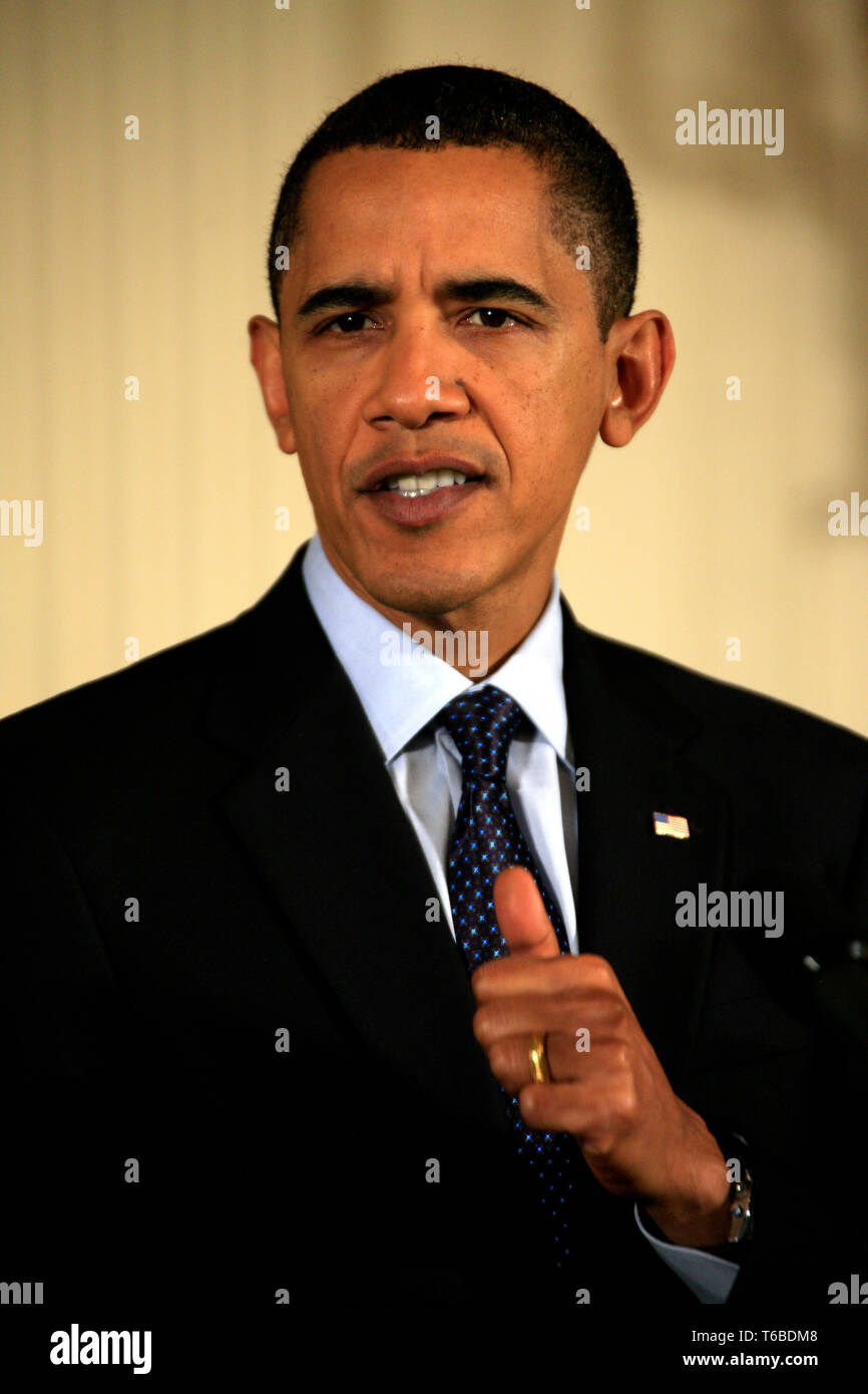 The President of the United States, Barack Obama, signs into law ...