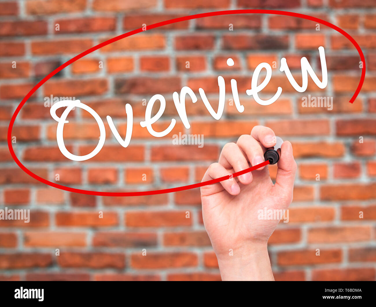 Man Hand writing Overview with black marker on visual screen Stock ...