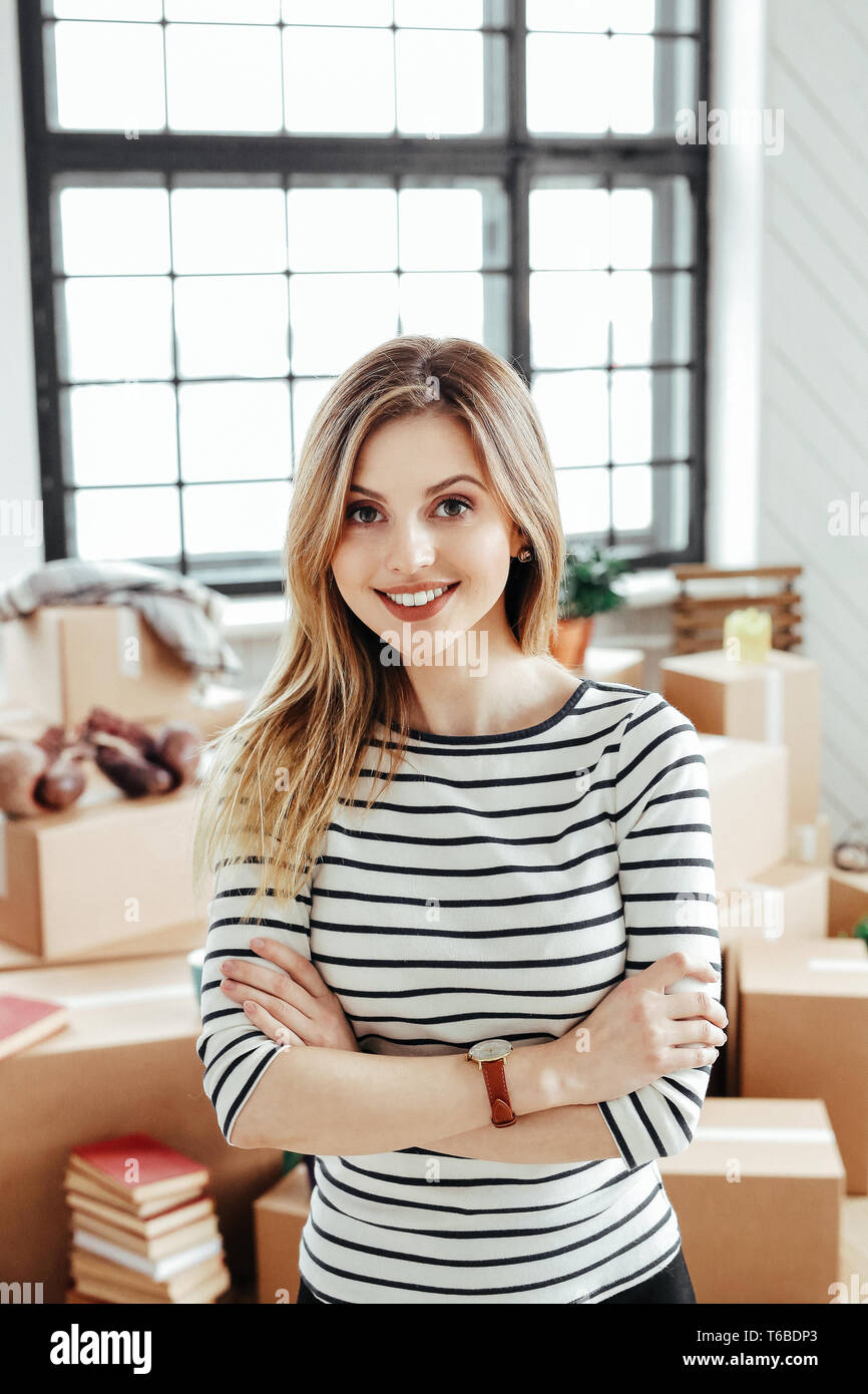 Girl is moving to new home Stock Photo - Alamy