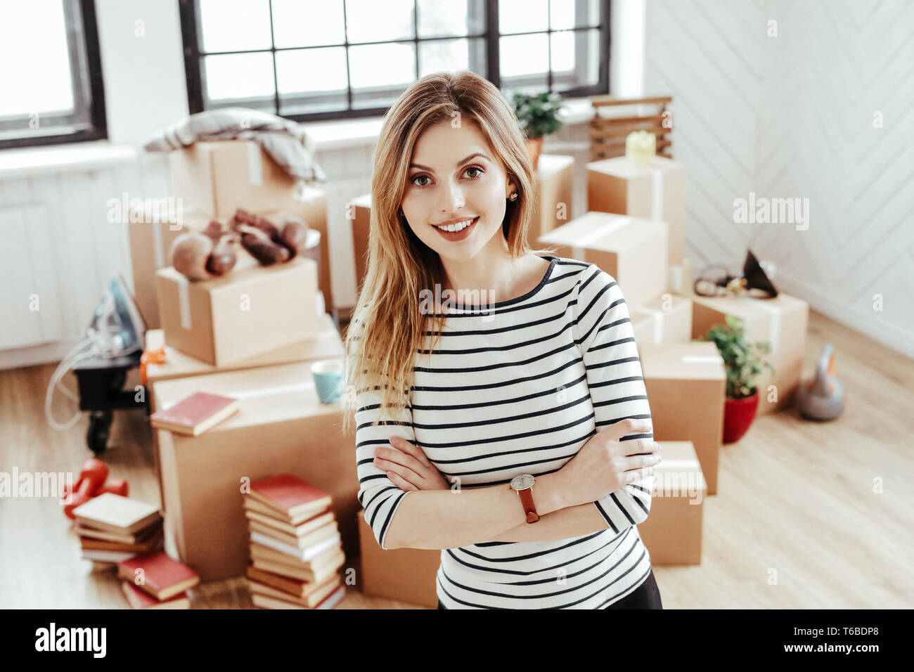 Girl is moving to new home Stock Photo - Alamy