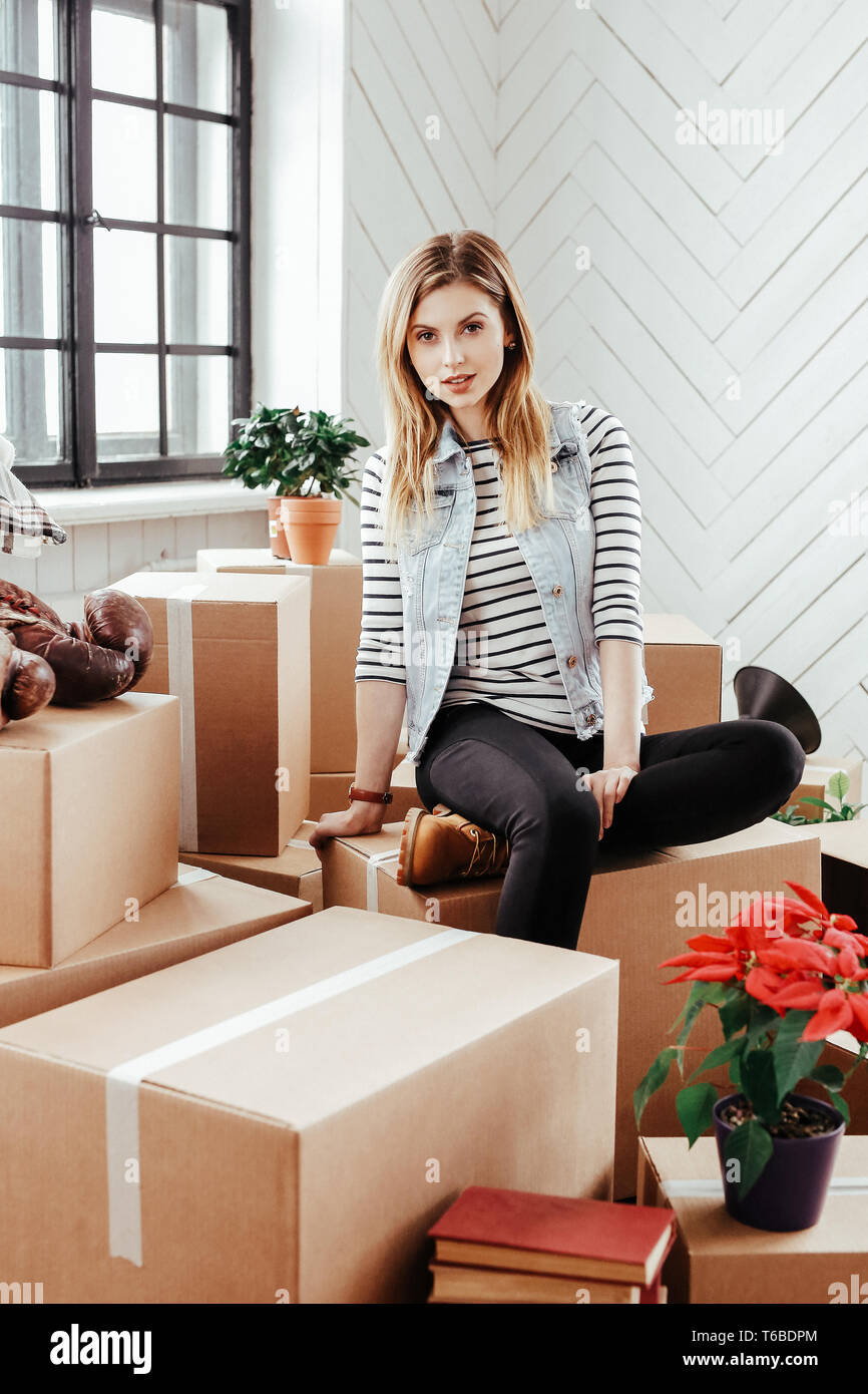 Girl is moving to new home Stock Photo - Alamy