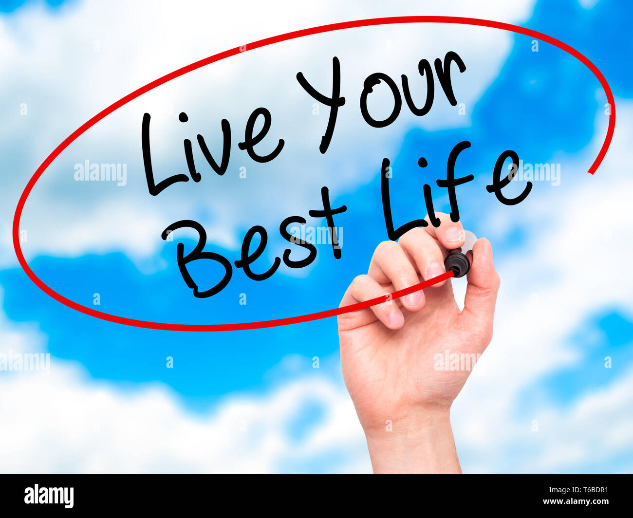 Man Hand writing Live Your Best Life with black marker on visual screen ...