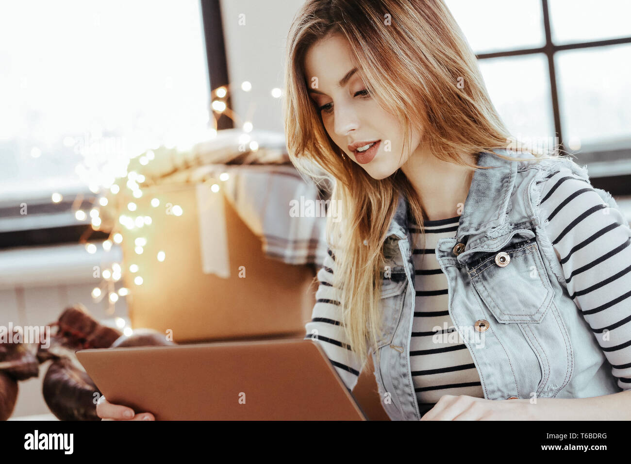 Girl is moving to new home Stock Photo - Alamy