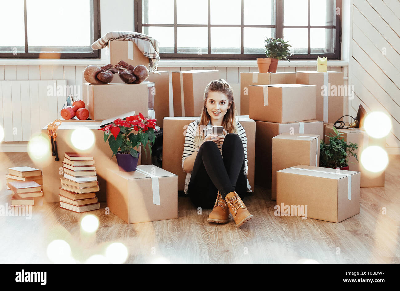 Girl is moving to new home Stock Photo - Alamy