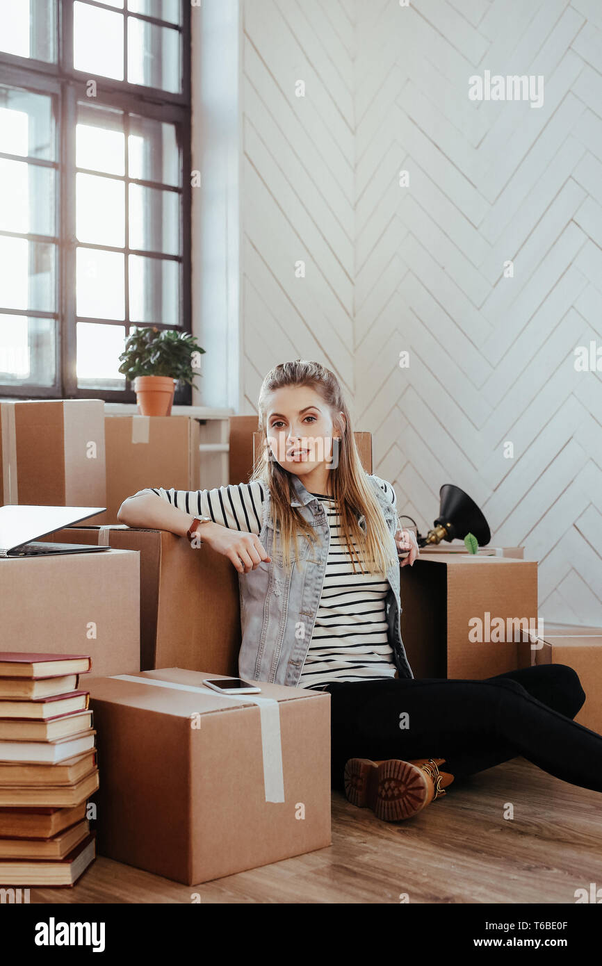 Girl is moving to new home Stock Photo - Alamy