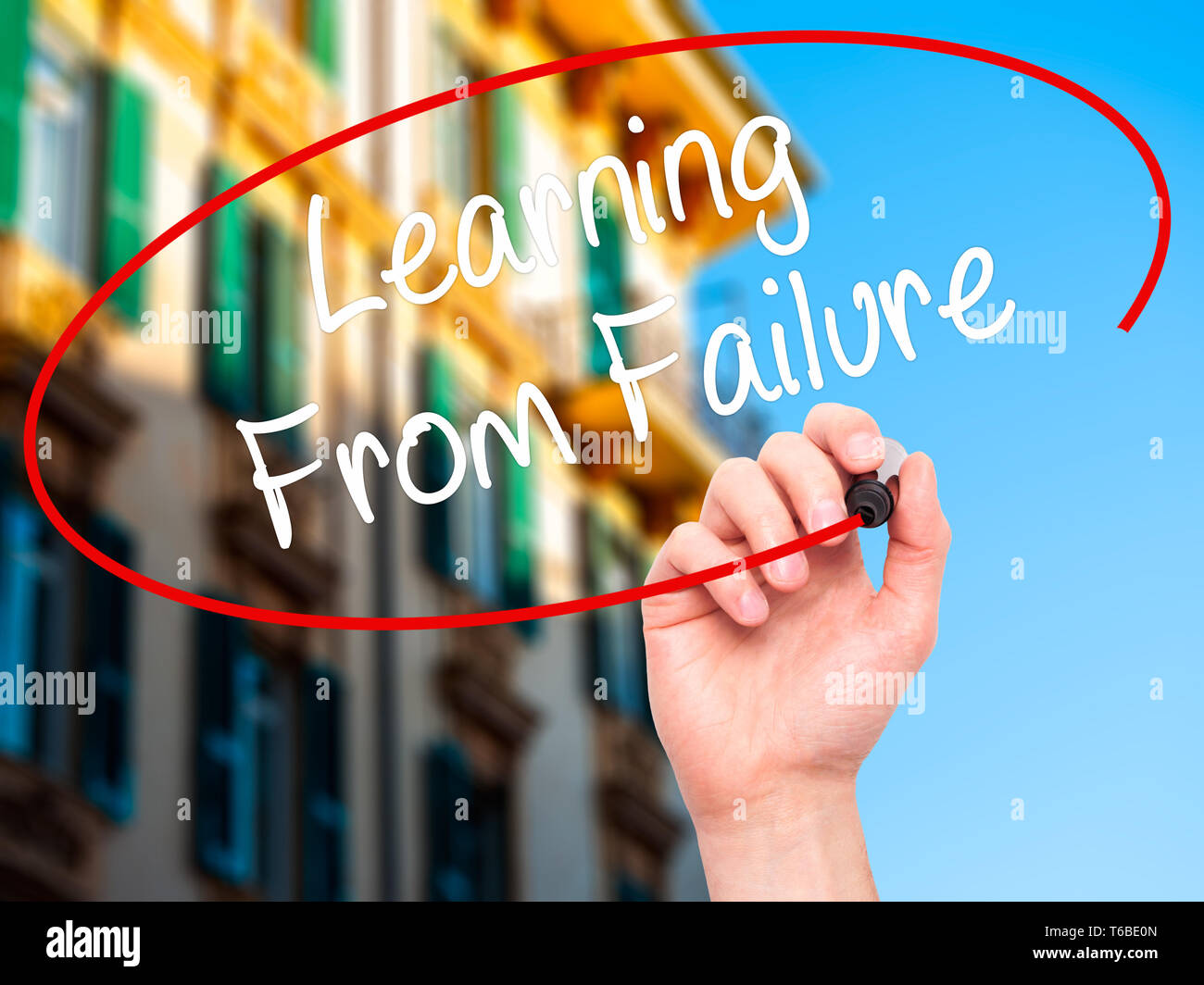 Man Hand writing Learning From Failure with black marker on visual ...