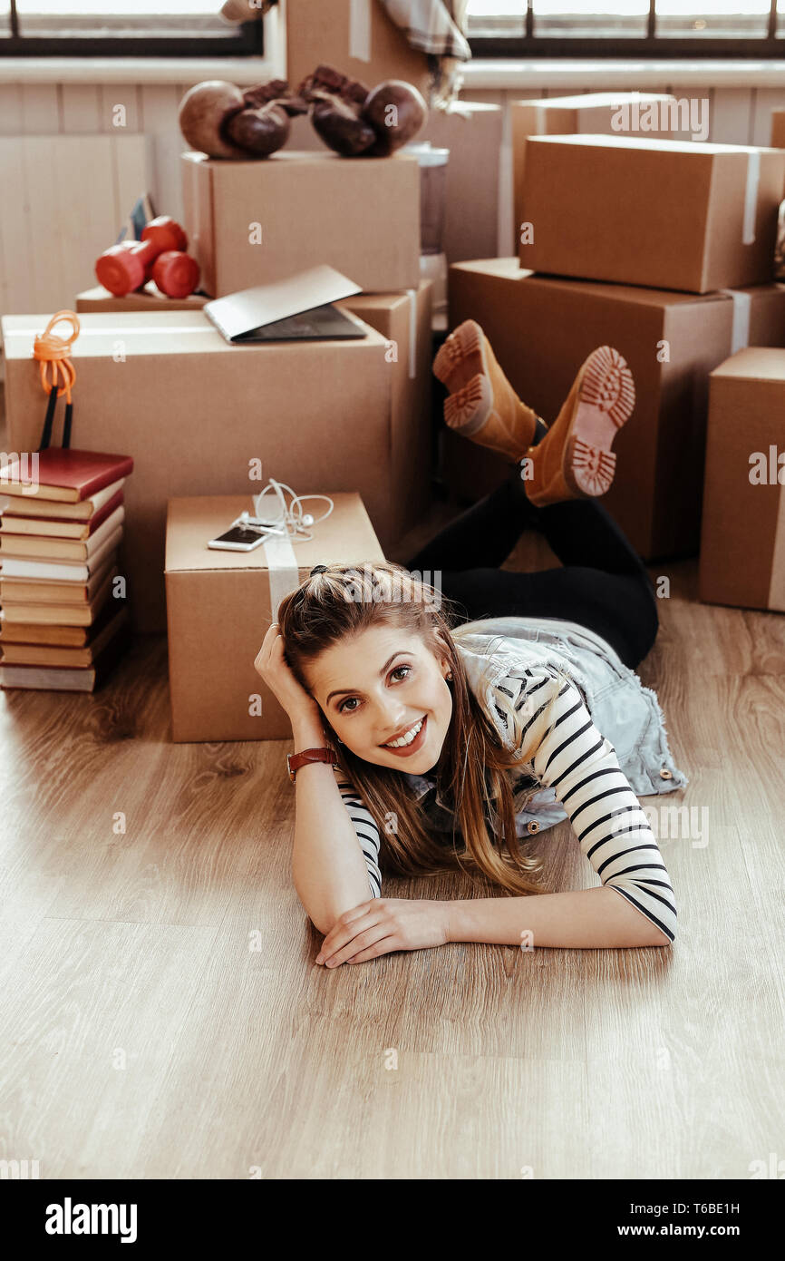 Girl is moving to new home Stock Photo - Alamy