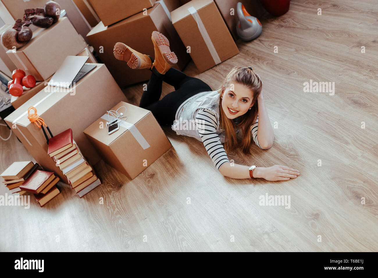 Girl is moving to new home Stock Photo - Alamy